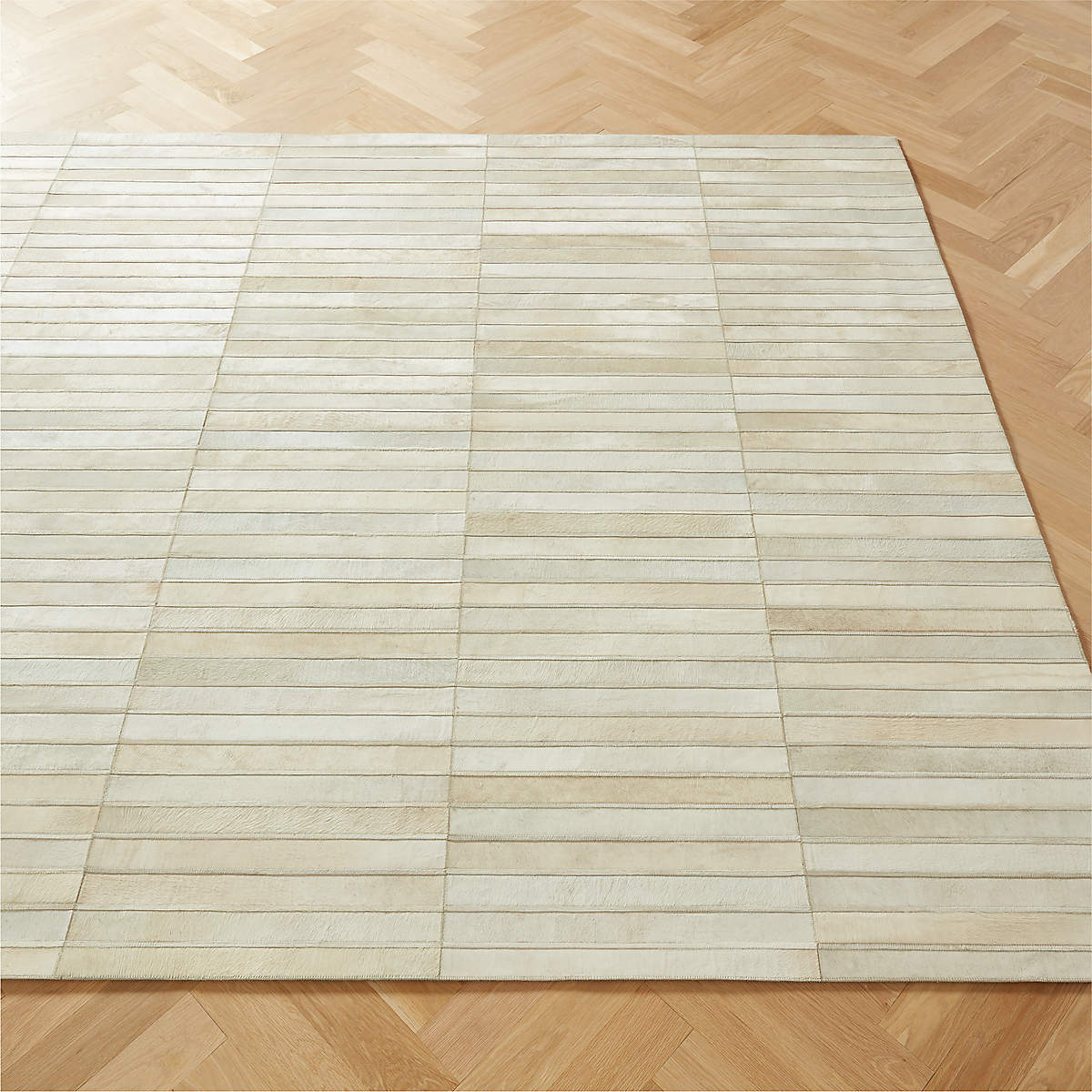 Camilia Patchwork Hide Ivory Area Rug | CB2
