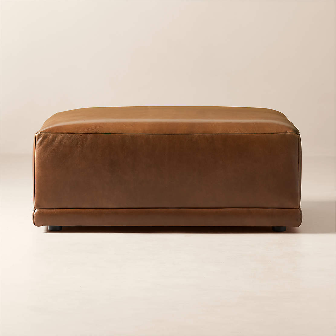 Saddle Leather Tufted Ottoman | CB2
