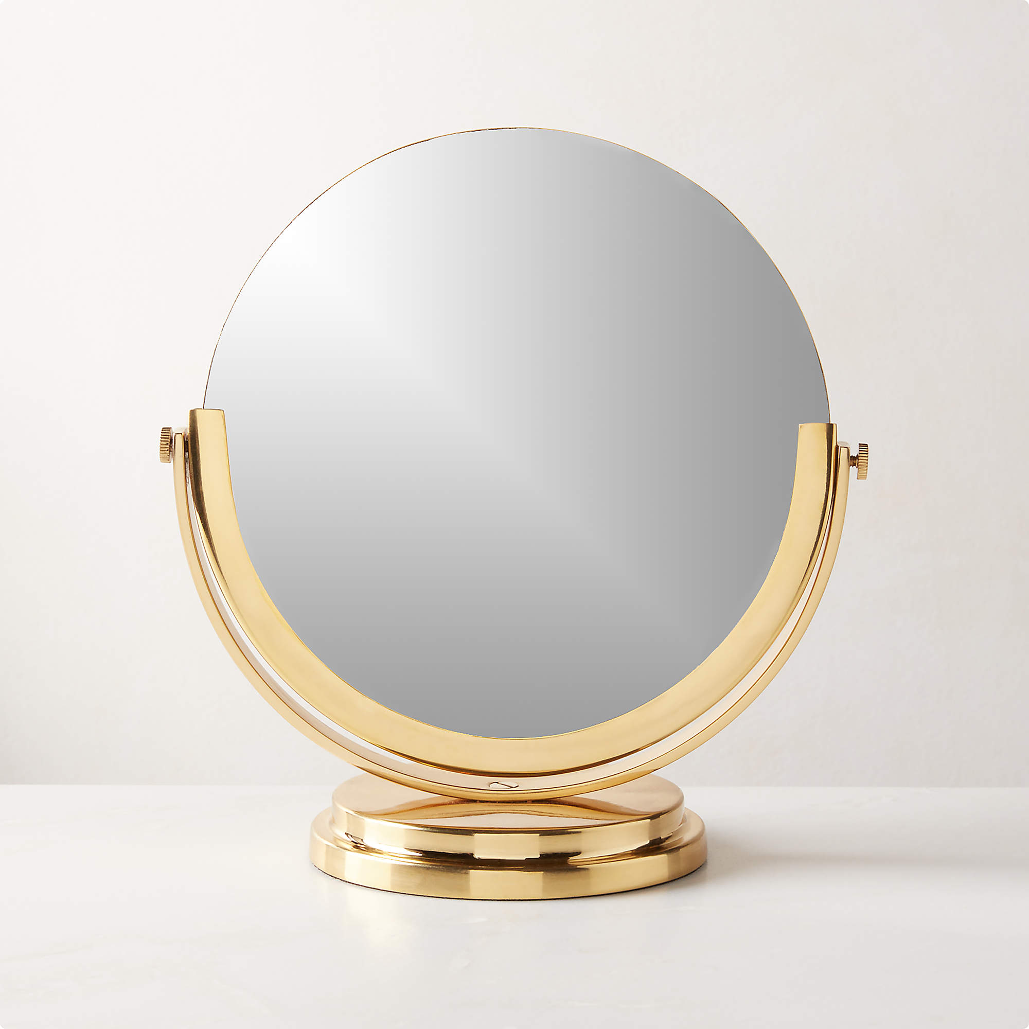 Mimi Rotating Polished Brass Vanity Mirror | CB2