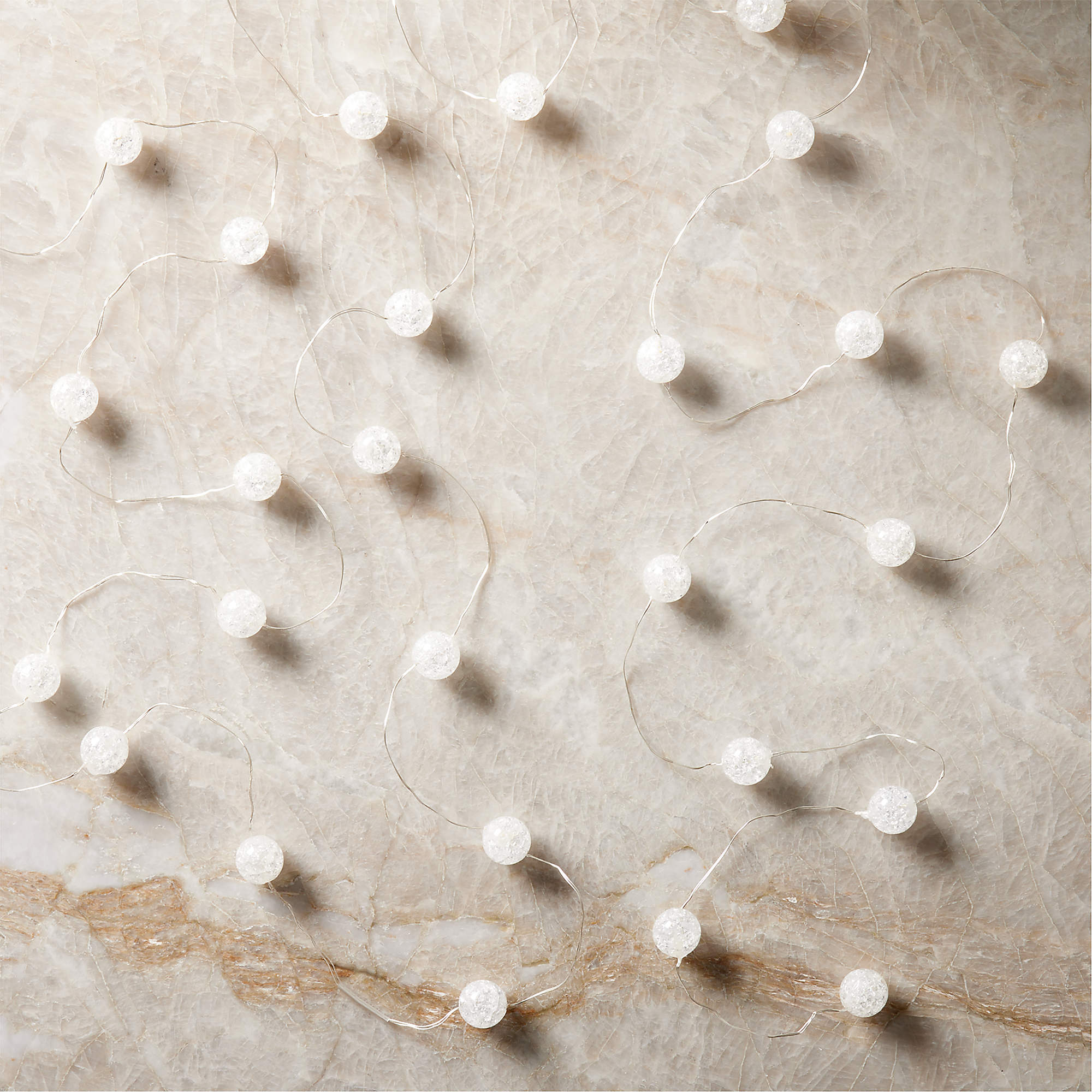 Mini Textured Warm White String Light 17' + Reviews | CB2