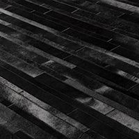 Modern Black Area Rugs: Dark Wool Rugs, Viscose and Natural Hide | CB2