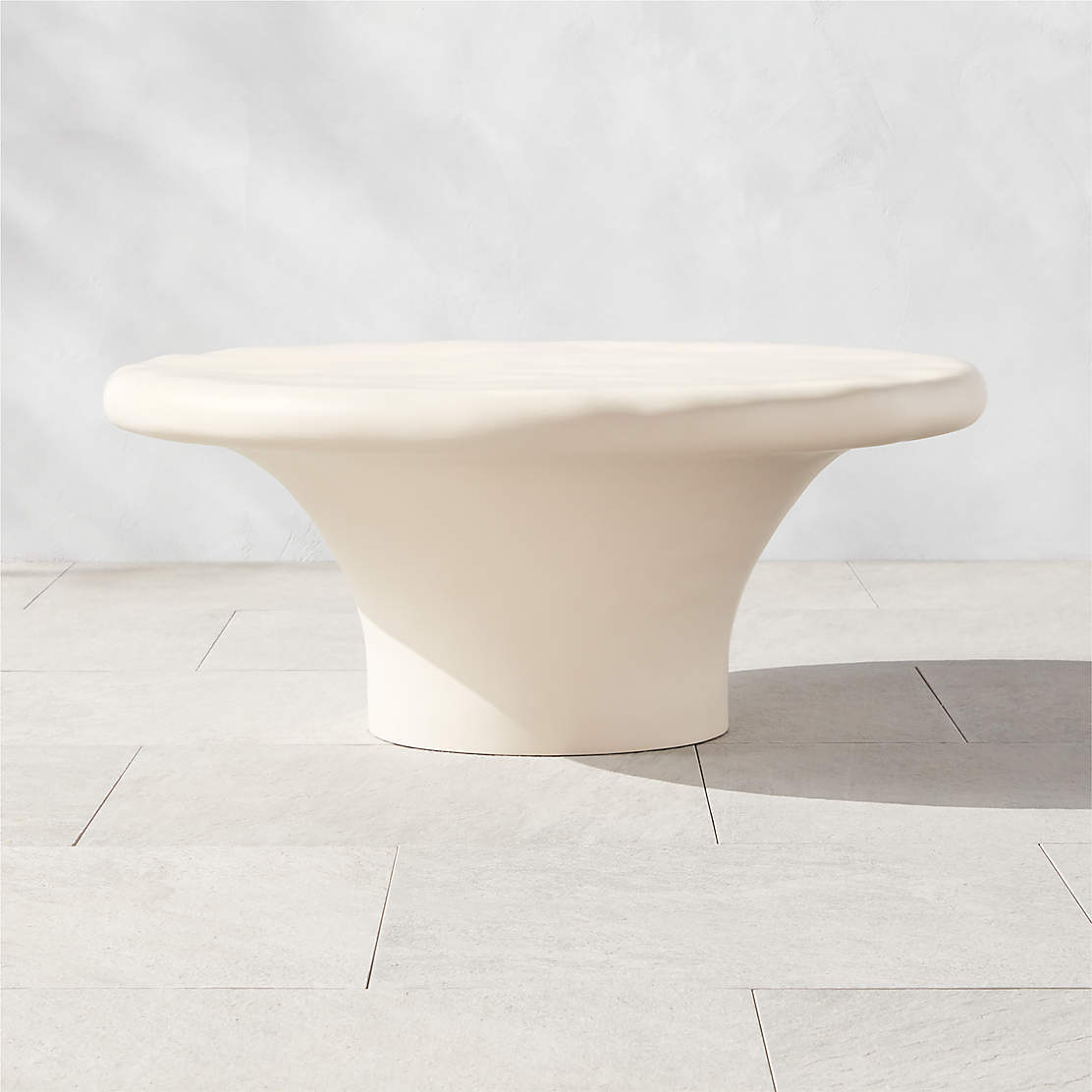 Bodene 50" Round Ivory Resin Coffee Table + Reviews | CB2