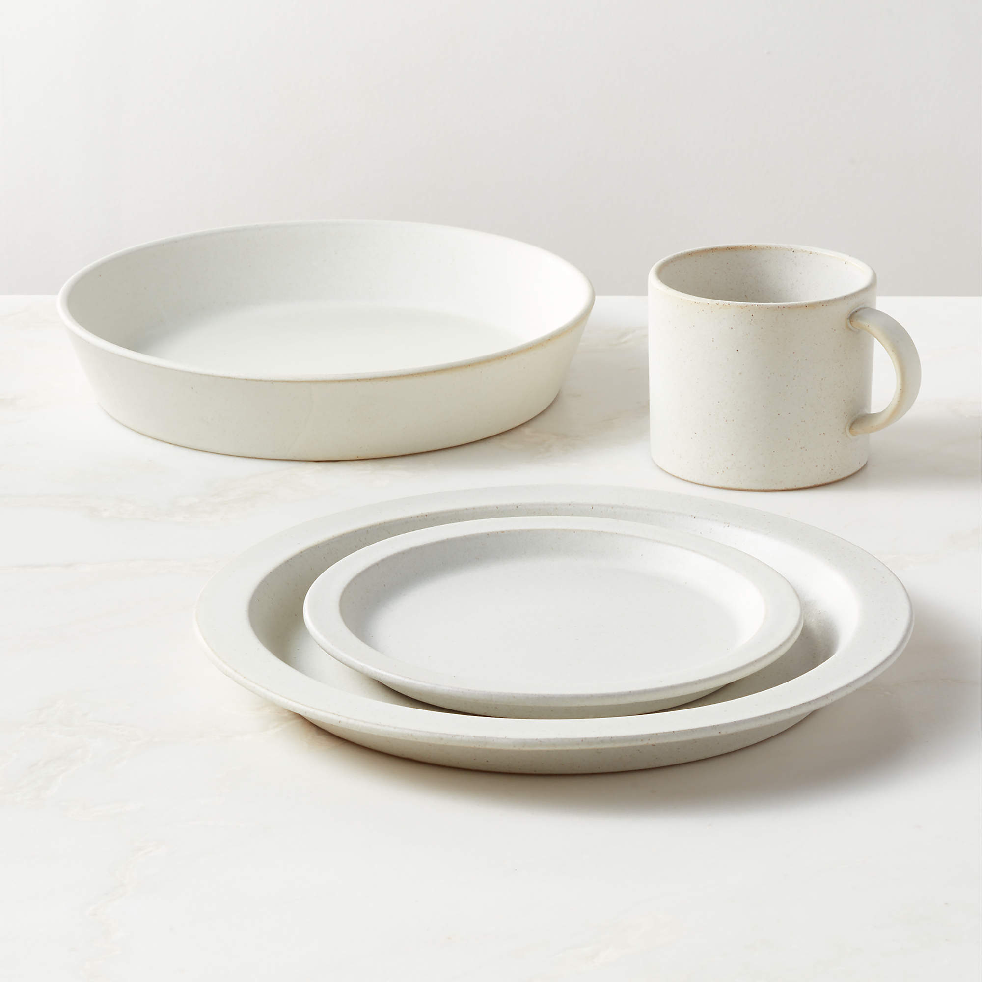 Swoon 4-Piece Off-White Dinnerware Set with Pasta Bowl with Reactive Glaze | CB2