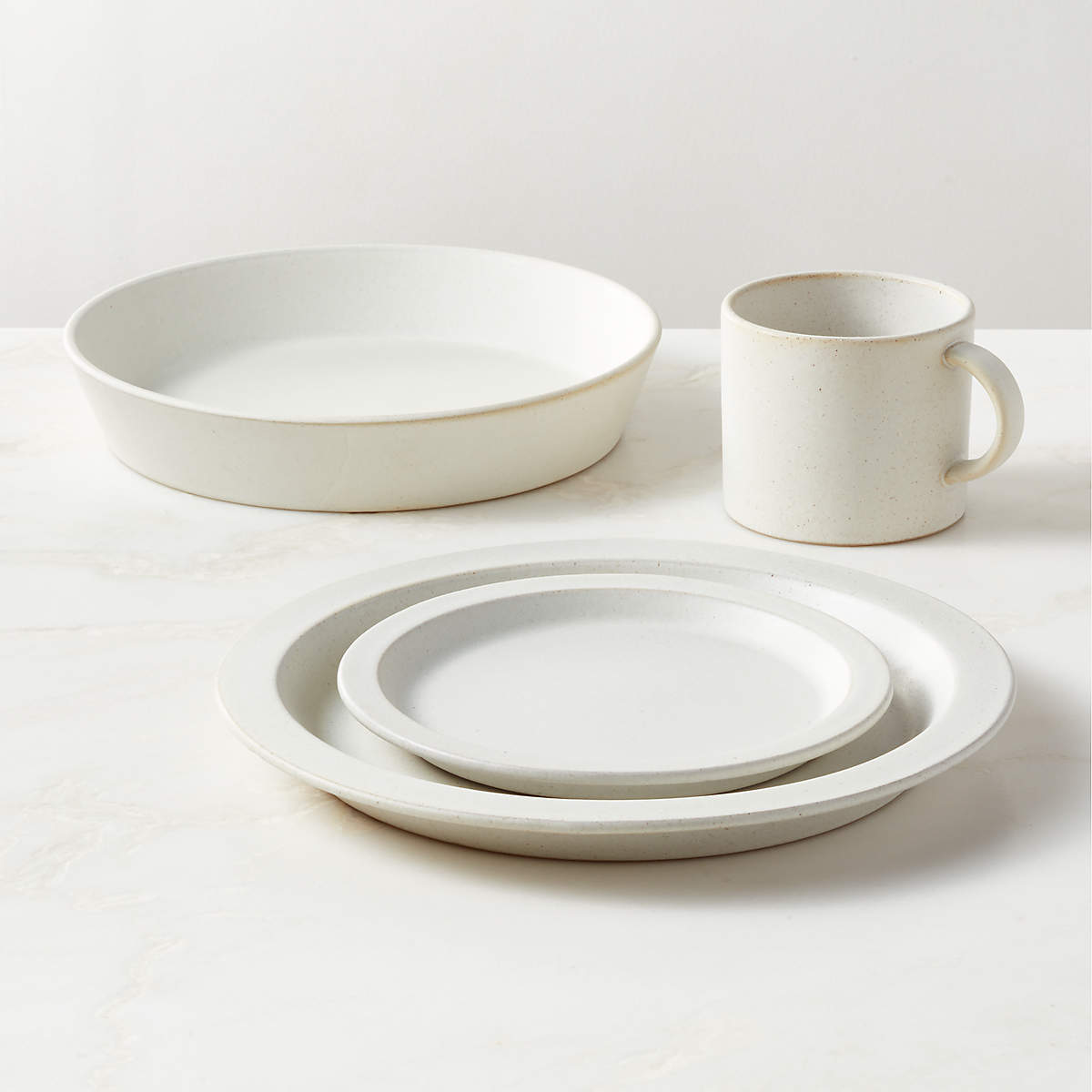 Swoon 4-Piece Off-White Dinnerware Set with Pasta Bowl with Reactive Glaze | CB2