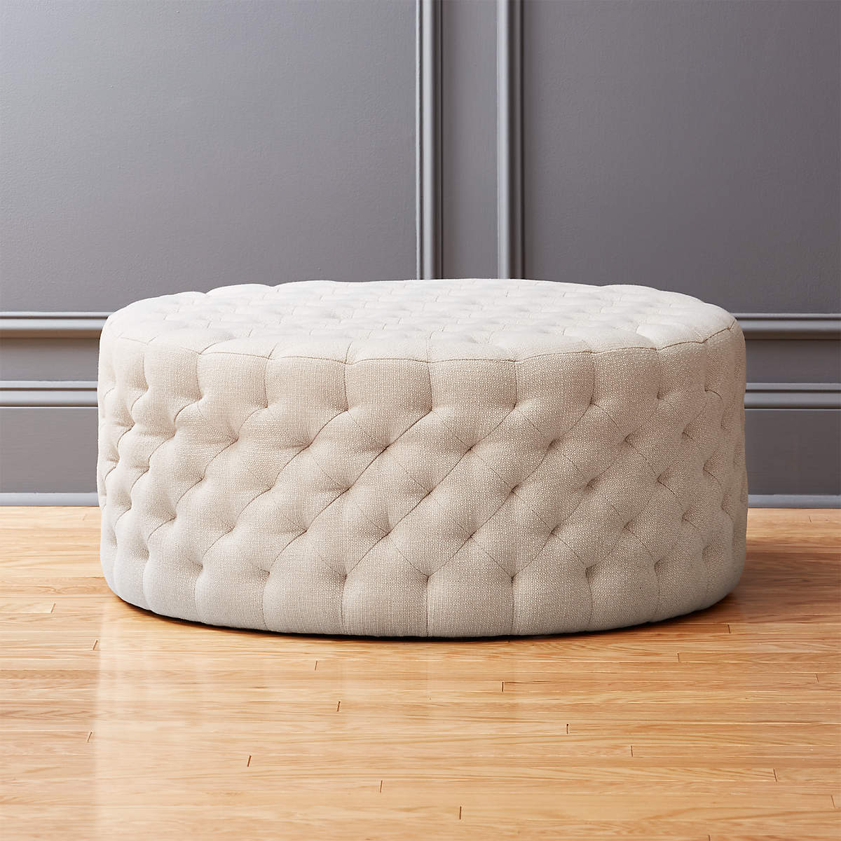 Natural Round Tufted Ottoman + Reviews | CB2